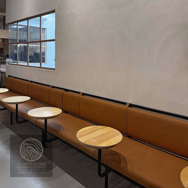 Custom Upholstered Bench with Integrated L-Arm Tables | yjinteriors